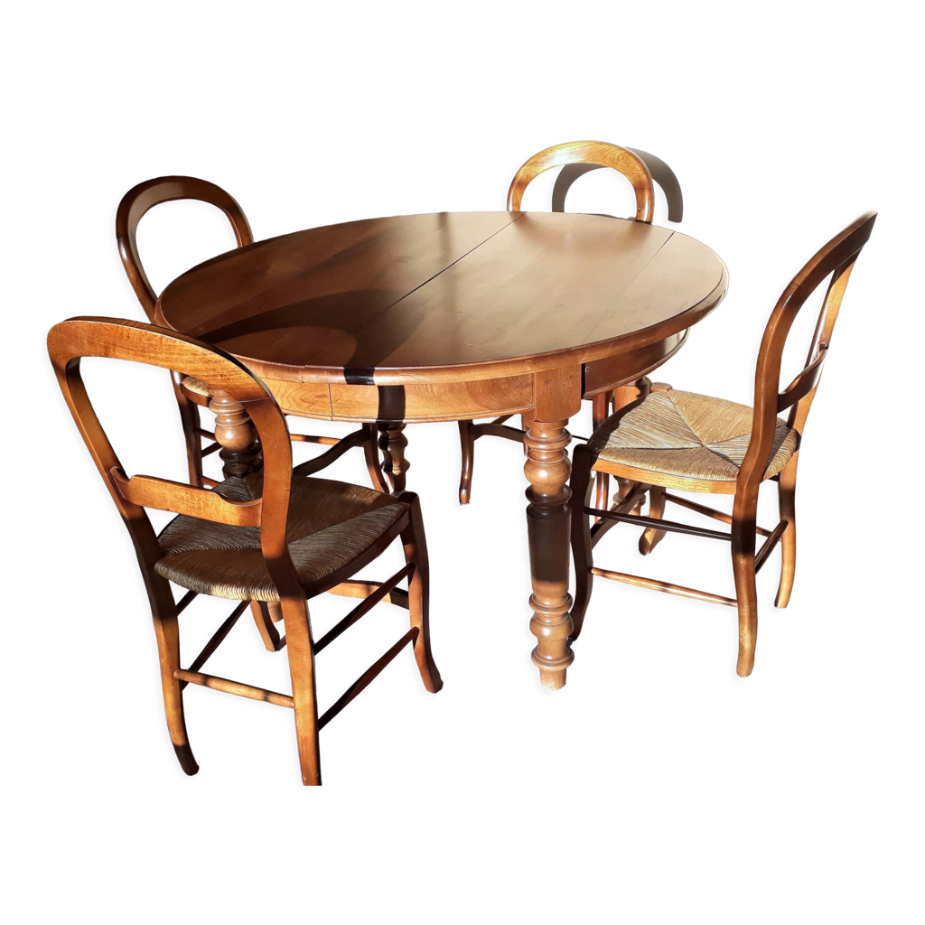 Table ronde en noyer massif et 4 chaises en option | Selency