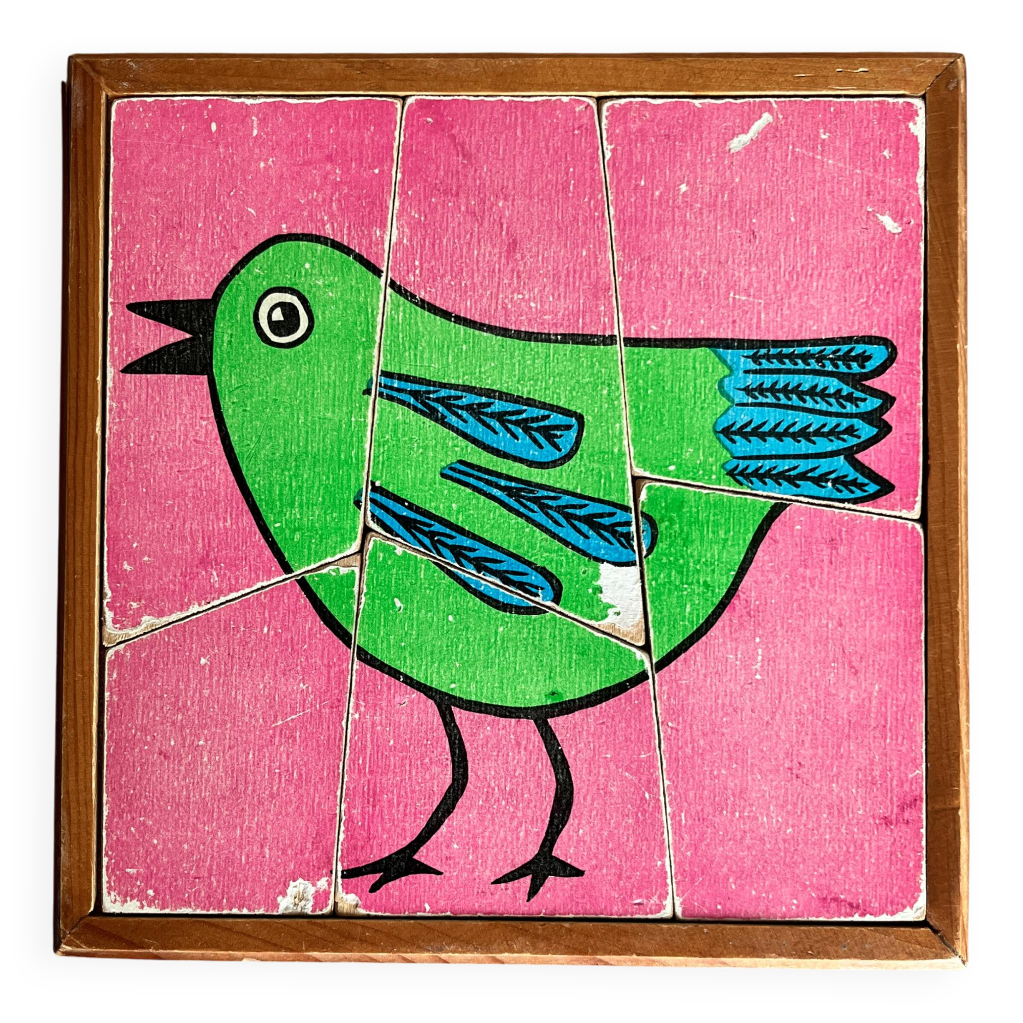 Cadre puzzle en bois des années 60 représentant un oiseau sur fond rose ...
