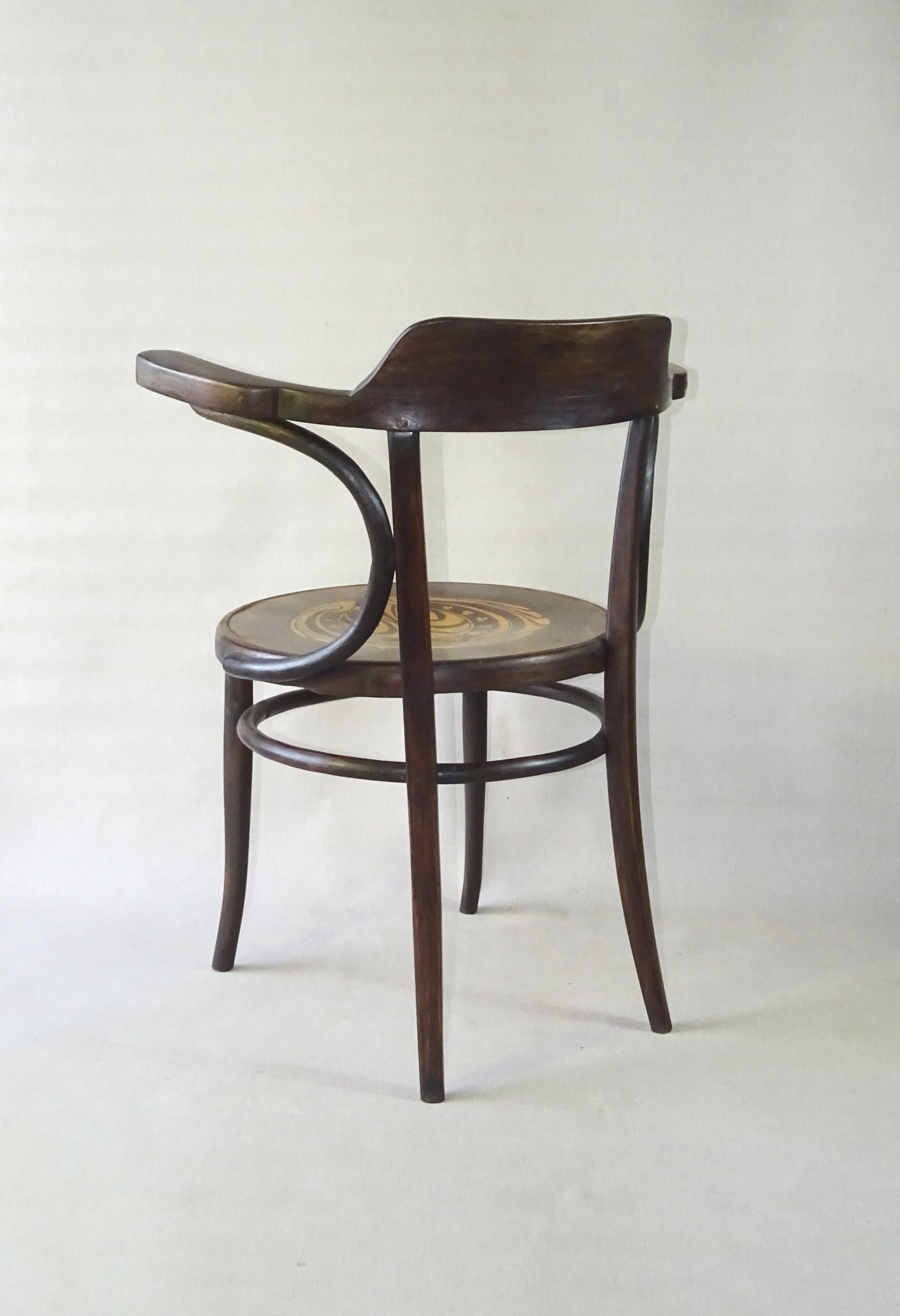 Fauteuil bistrot bois-courbé N°704 par KOHN , 1913 | Selency