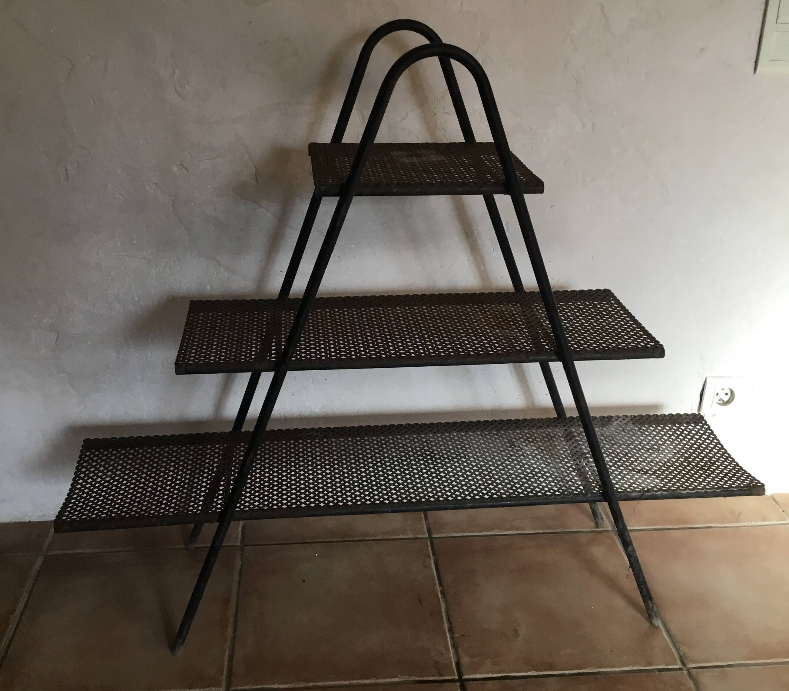 Black lacquered perforated sheet metal display shelves from the 50s ...