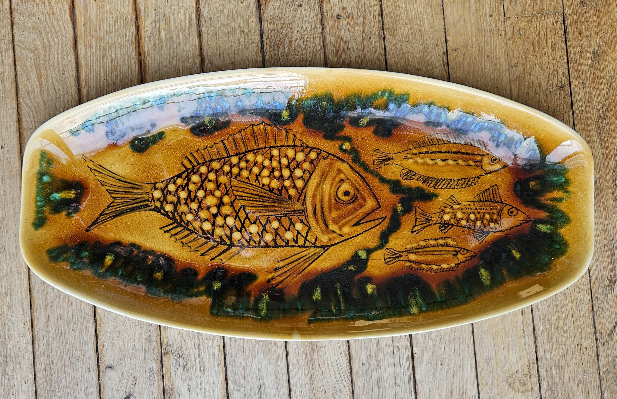 Plat à poisson Faïencerie Longchamp. Dessins attribués à Robert Picault ...