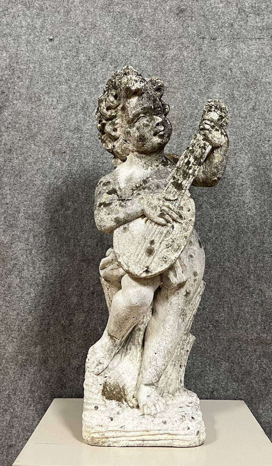 Reconstituted stone statue "putti with a mandolin" circa 1950 | Selency