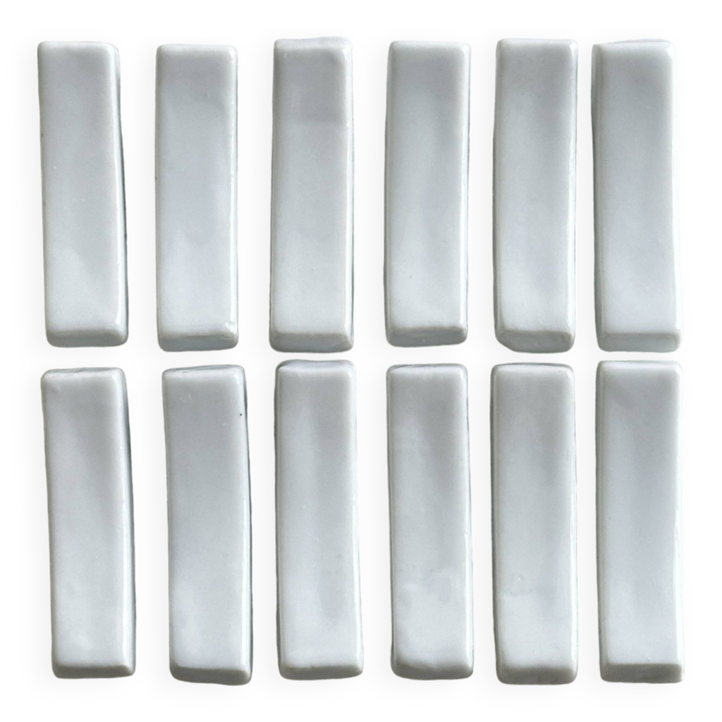 12 repose baguettes, repose couteaux en porcelaine blanche. | Selency