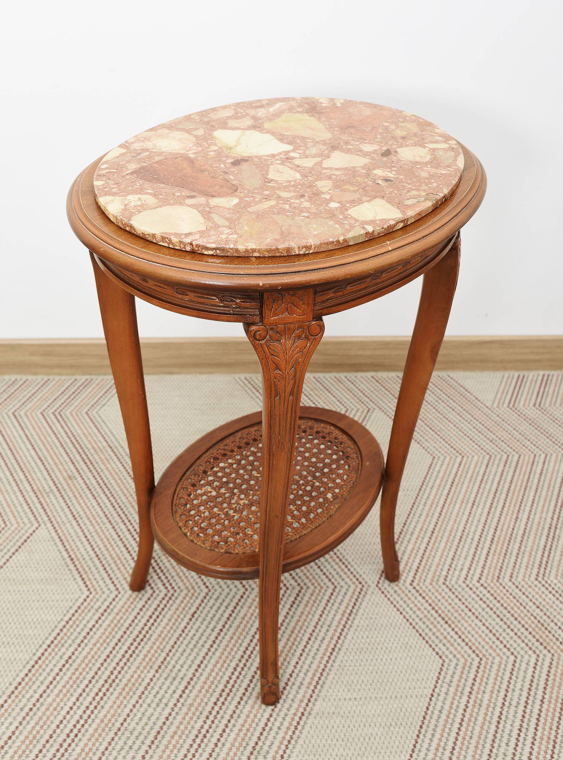 Oval pedestal table, pink marble top, carved cherry and canework | Selency
