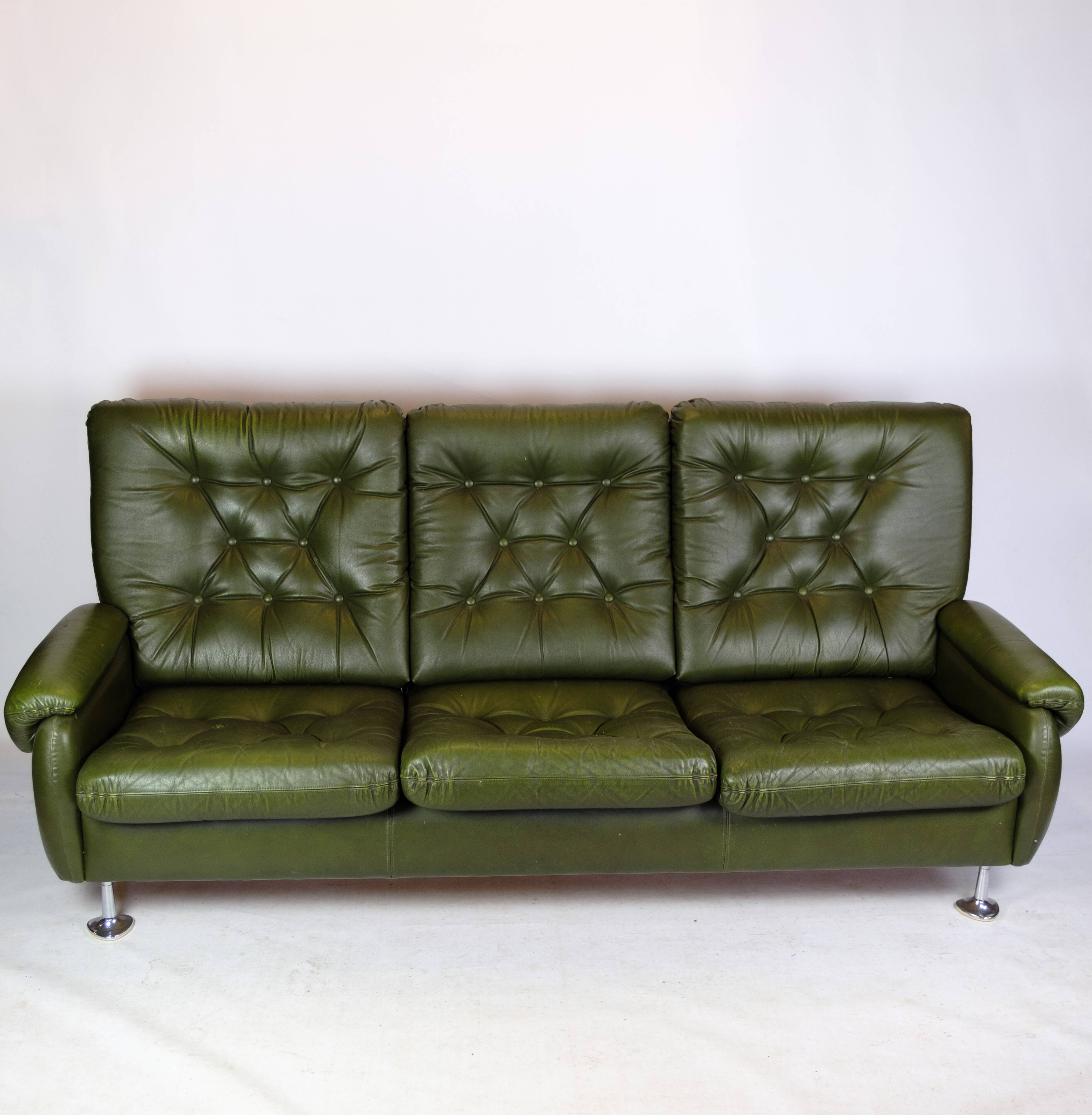 3 pers. sofa in dark green leather with chrome legs from 1970s | Selency