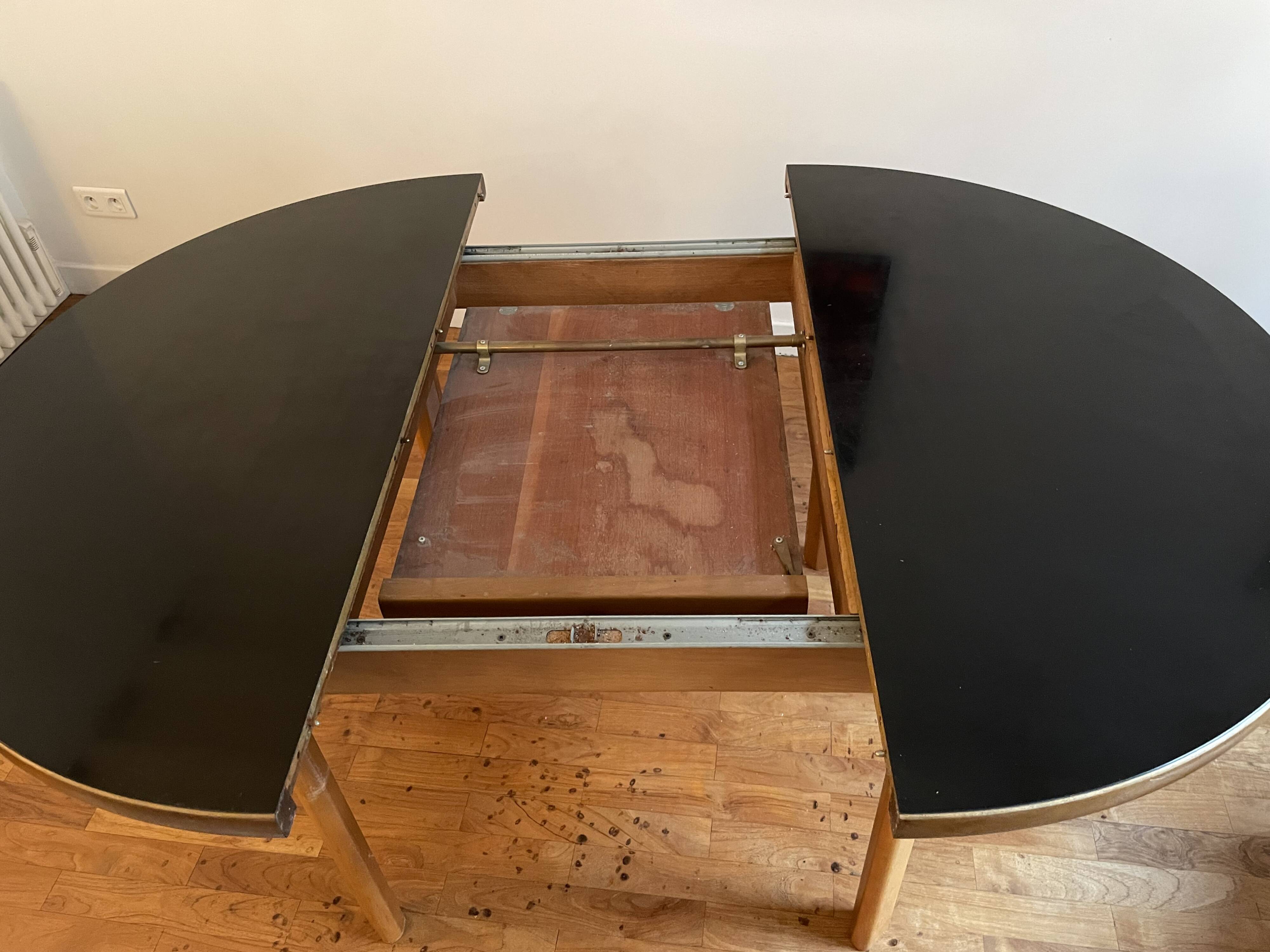 Table ronde de salle à manger en orme, avec rallonge - plateau formica noir | Selency