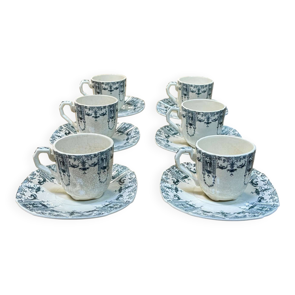6 tasses et sous tasses en faïence de Gien décor Mascaron début XXème ...